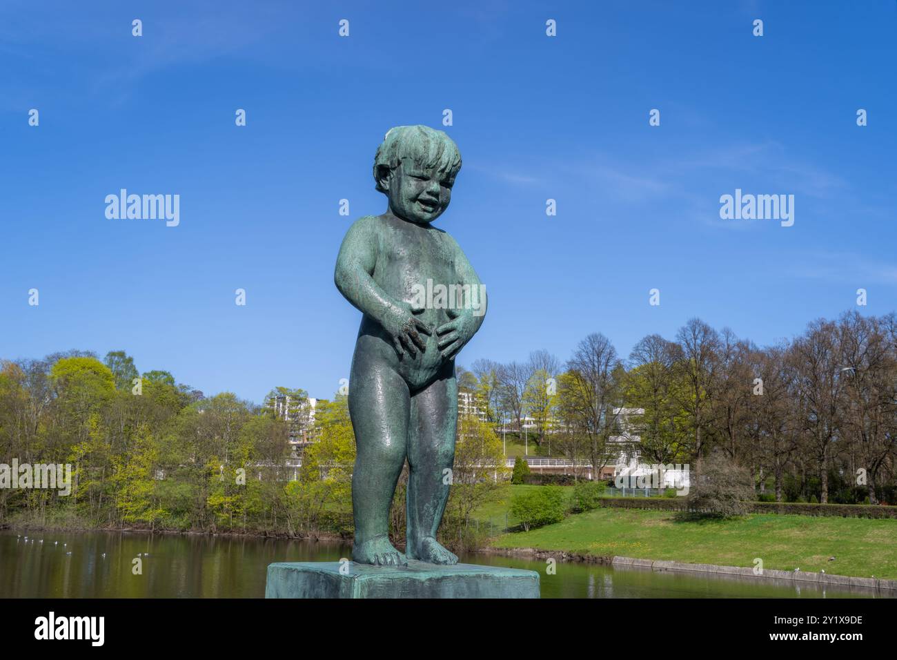 Oslo, Norway - May 3, 2024: A bronze sculpture of a little boy giggling ...