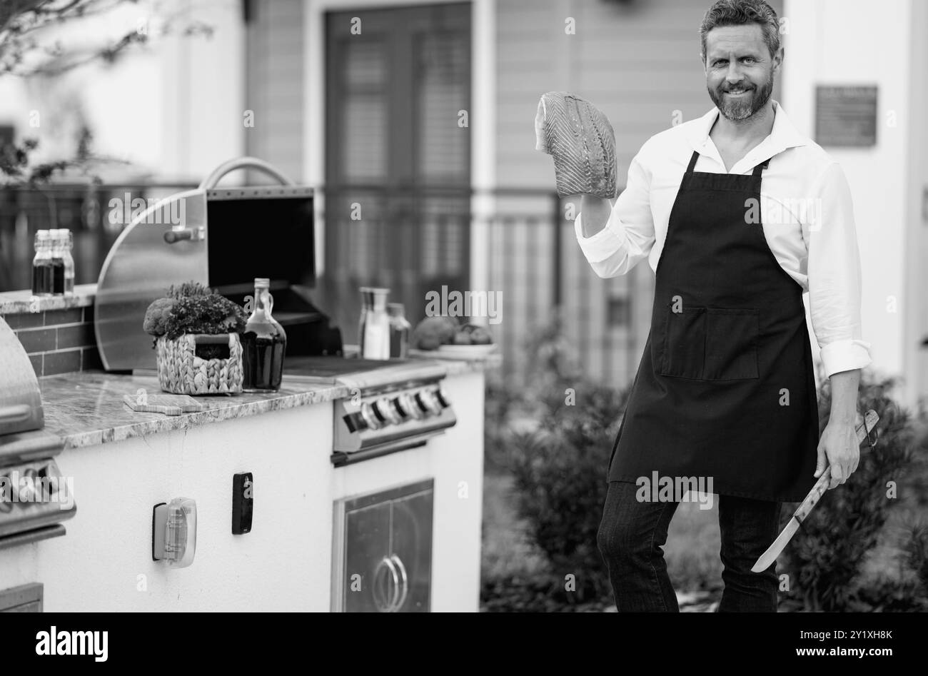Picnic concept man hold Black and White Stock Photos & Images - Alamy
