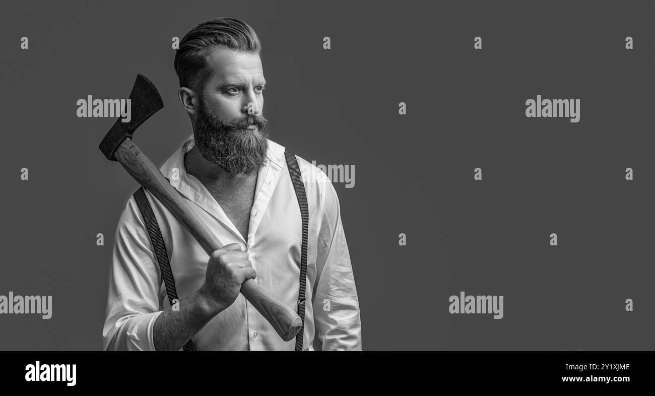 masculinity of man with axe on background, advertisement Stock Photo ...