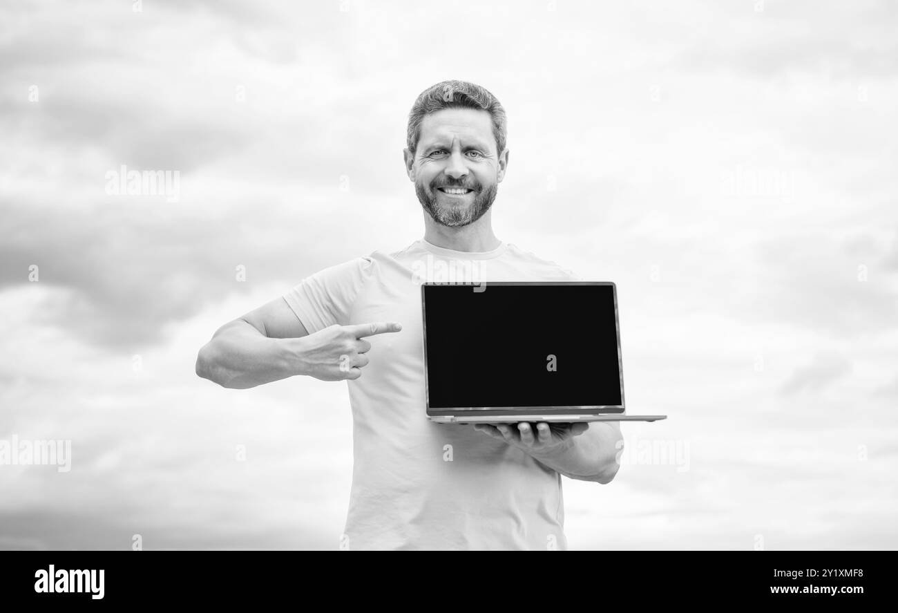 Man pointing finger laptop Black and White Stock Photos & Images - Alamy