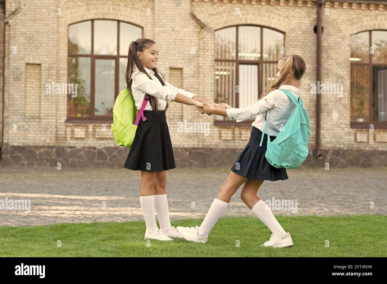 two school girls friends have fun together outdoor Stock Photo - Alamy