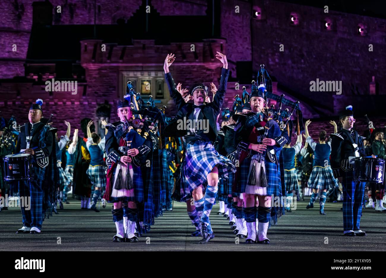 The Tattoo Dance company dancers dancing in kilts with soldiers wearing ...
