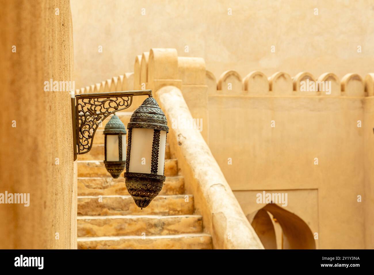 Traditionaly decorated wall lamps in the arabic citadel fortress inner ...