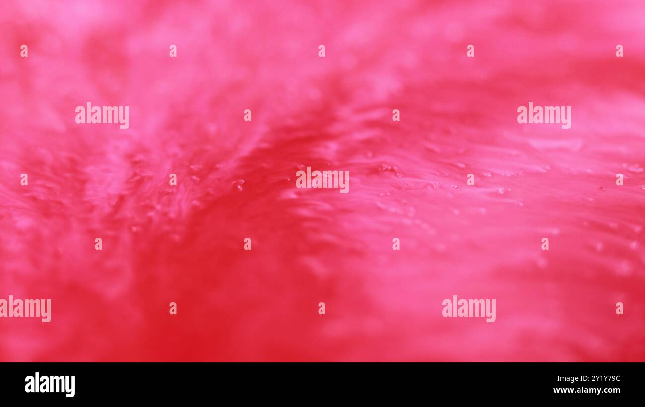 Paint splash. Fluid spill. Defocused bright red pink color emulsion texture acrylic liquid mix ...