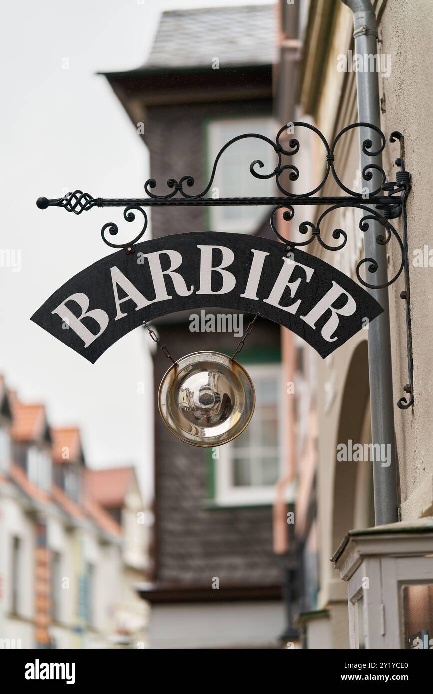 Guild sign and sign with the German inscription Barbier. Translation ...