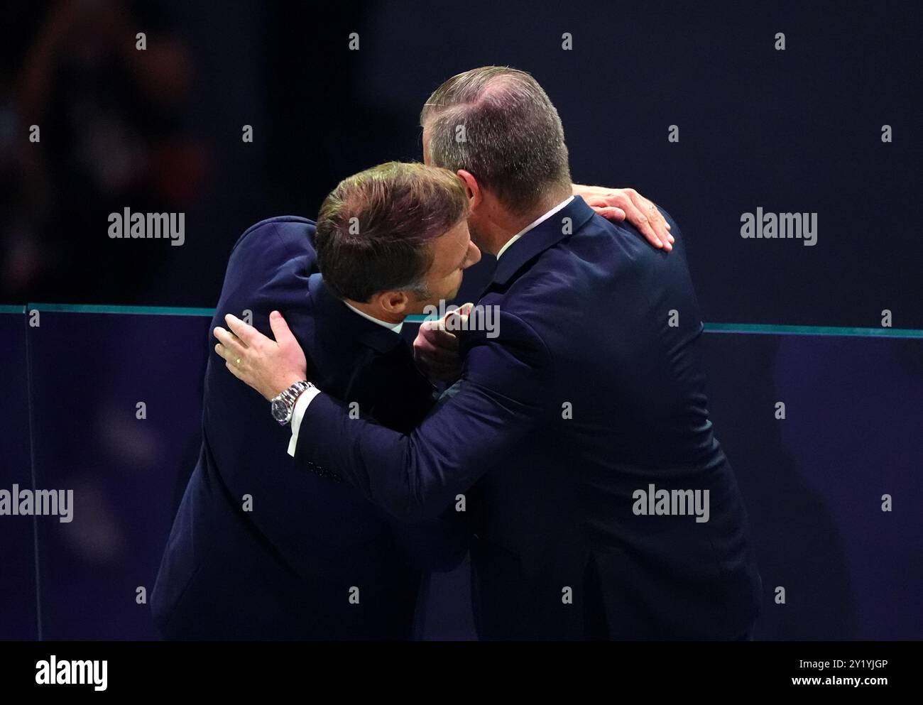 President of France Emmanuel Macron hugs IPC President Andrew Parsons ...