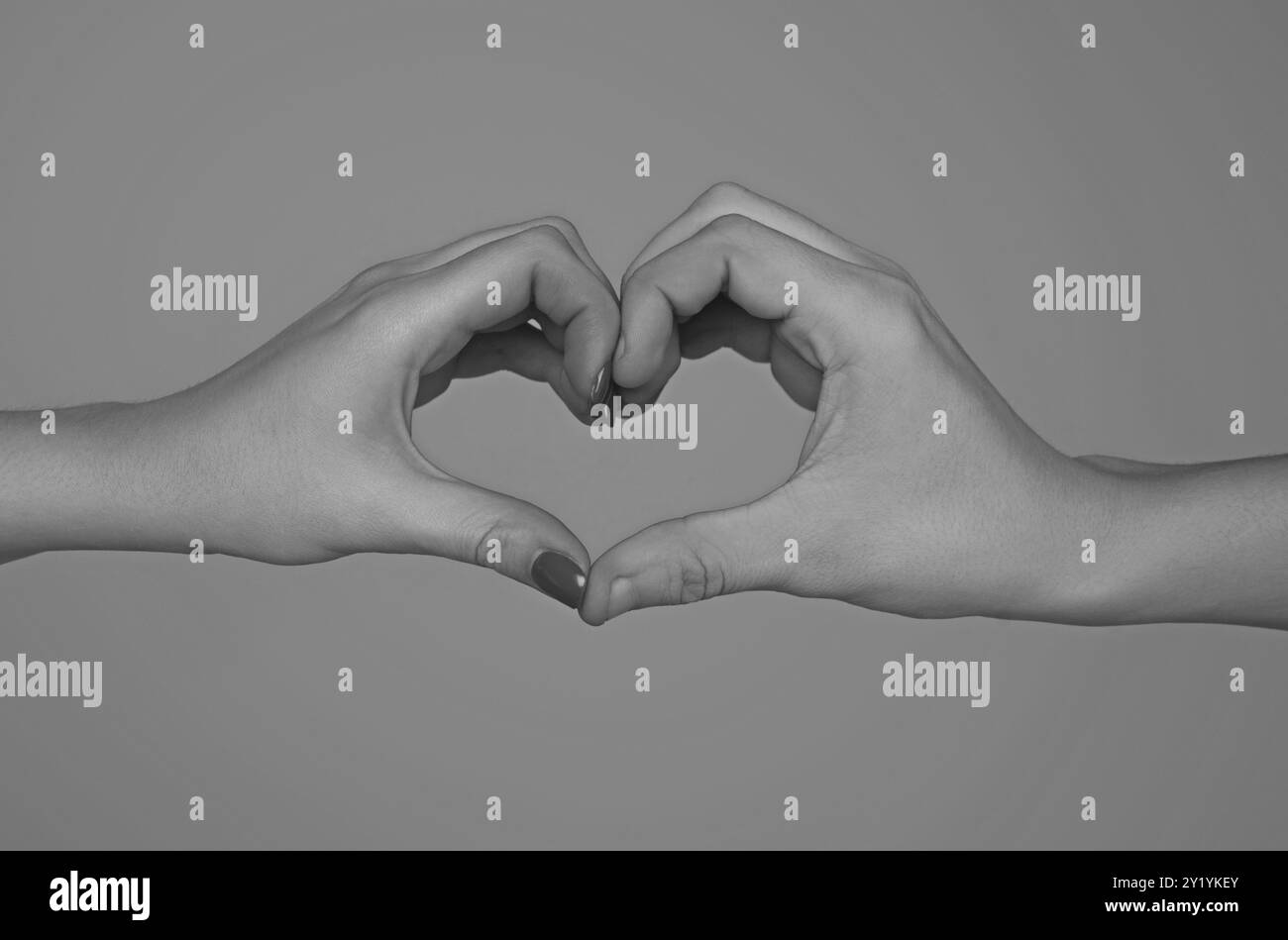 Female and male hands in form of heart. Hands in shape of love heart ...