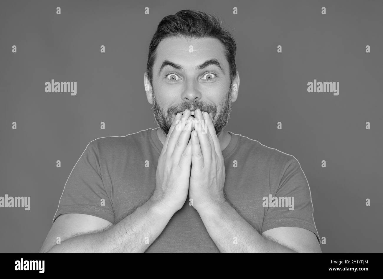 Studio isolated portrait of middle aged man with surprise facial ...