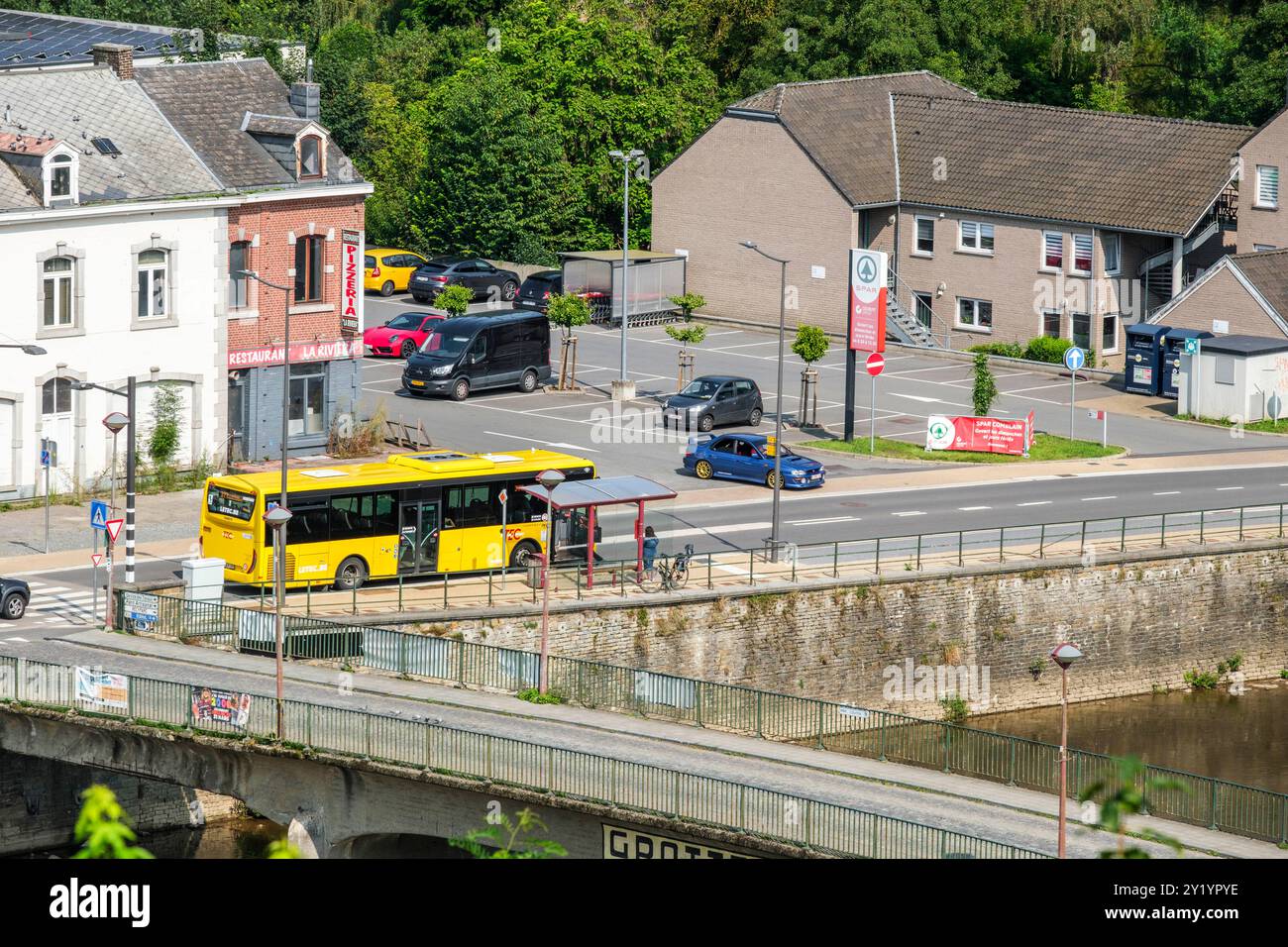 Tec Bus at the Bus stop in Comblain-au-Pont along the river Ourthe ...