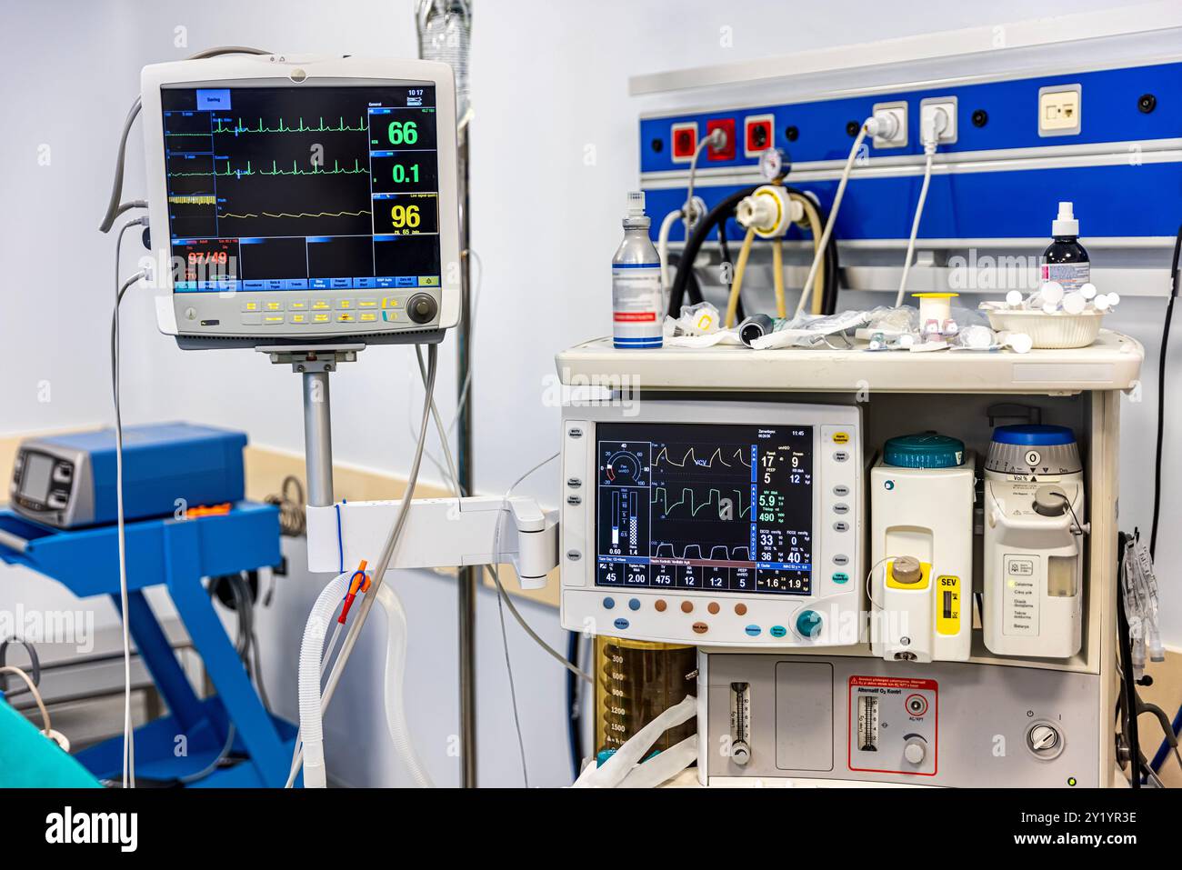 hospital monitor displaying vital signs: heart rate, blood pressure ...