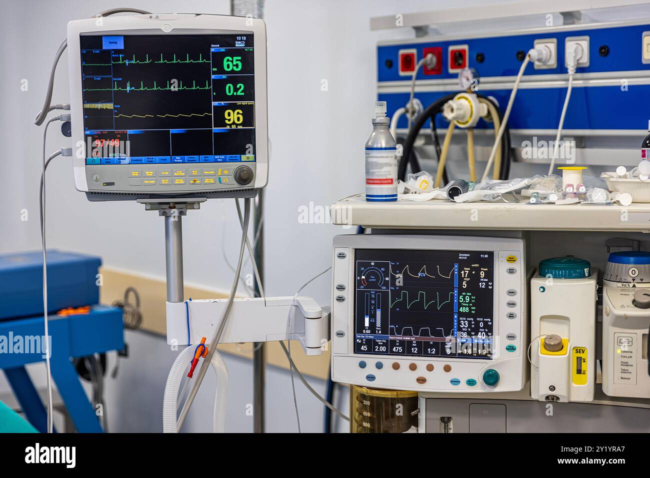 hospital monitor displaying vital signs: heart rate, blood pressure ...