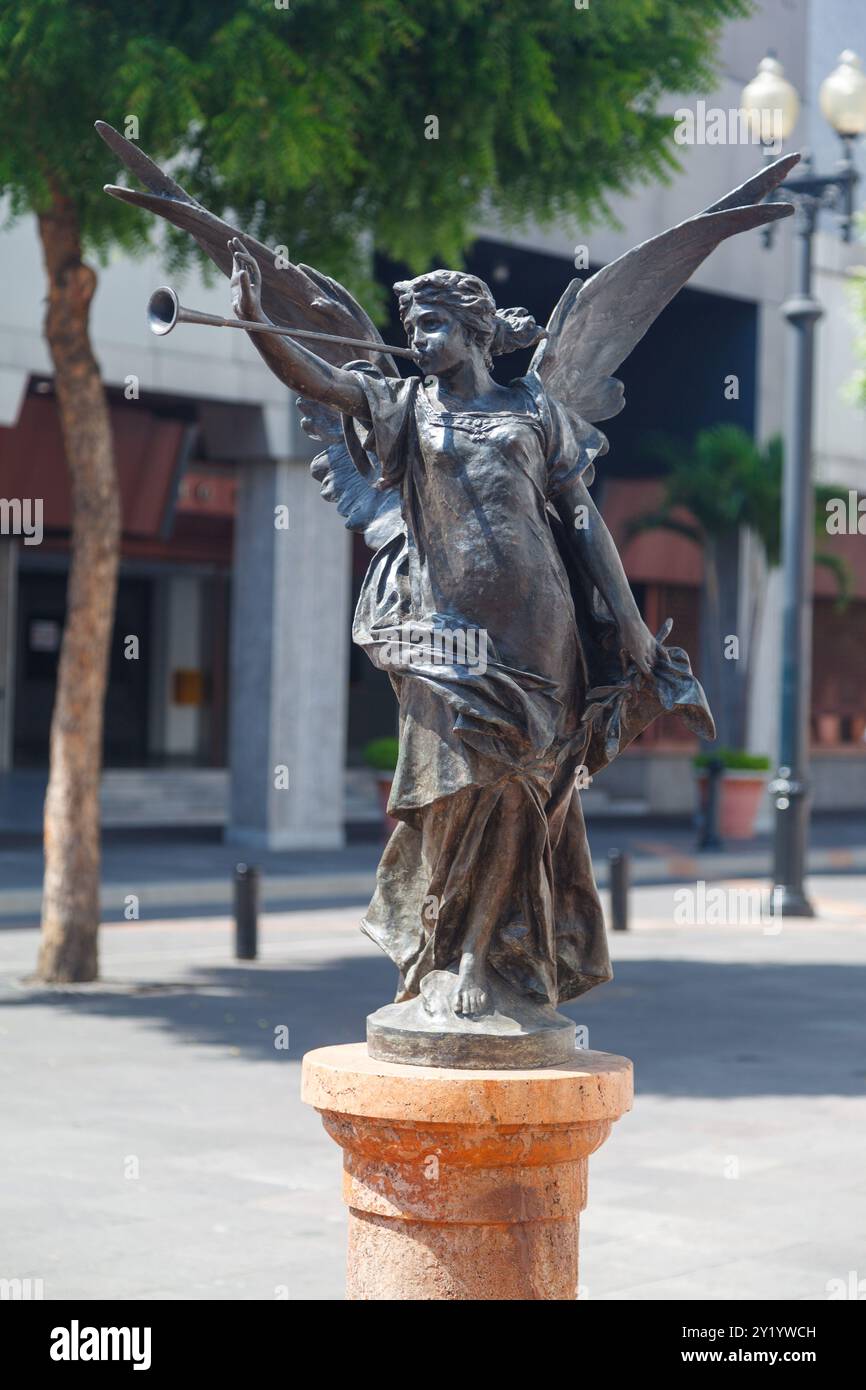 A Bronze Angel playing Trumpet statue in downtown Guayaquil, Ecuador ...