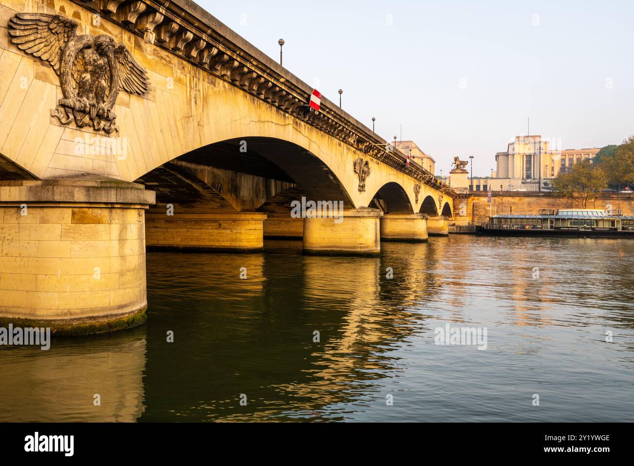 The view captures the Jena Bridge arching over the Seine River ...