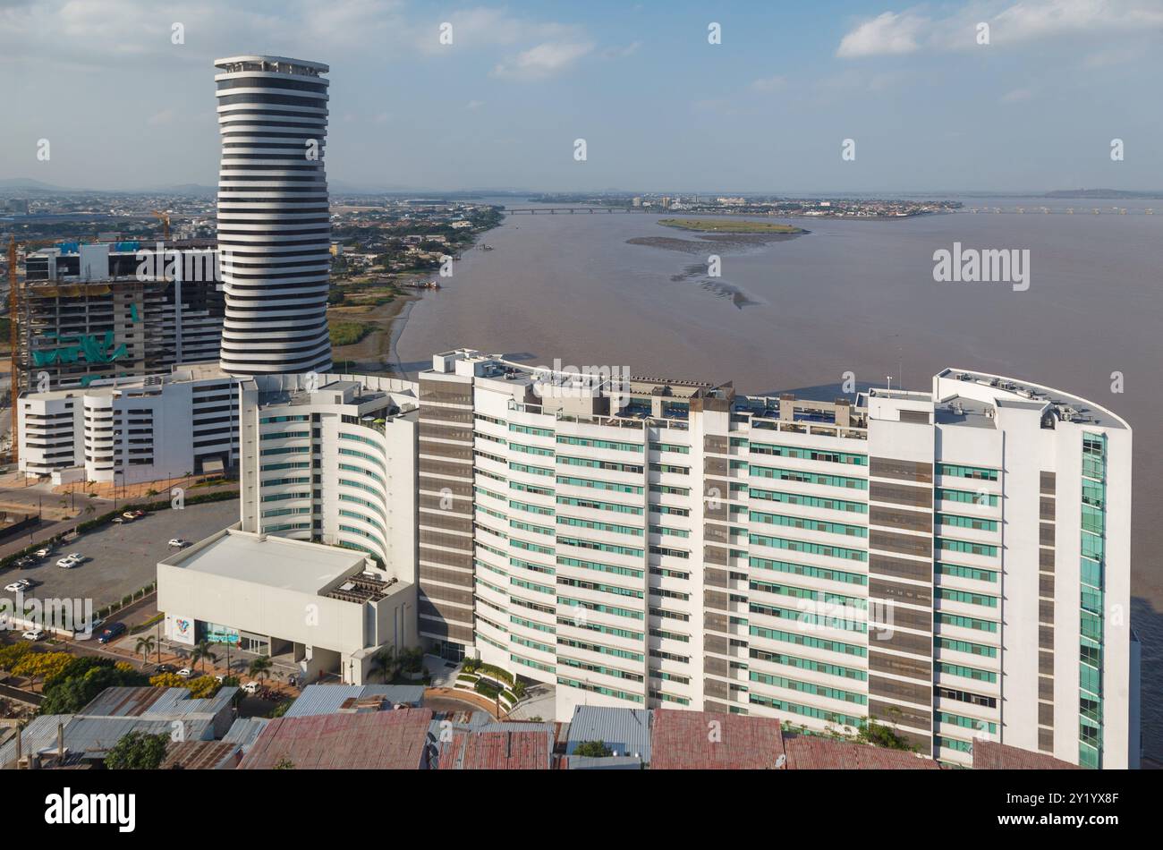 Modern buildings and the Point Tower skyscraper and Guayas river in ...
