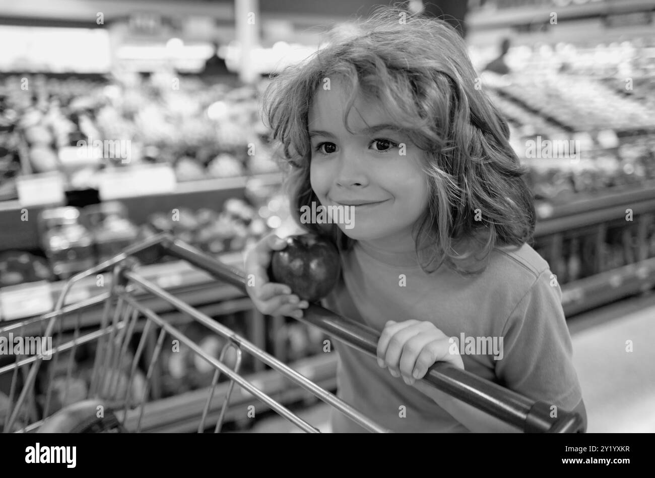 Shopping, discount, sale concept. Kid boy with shopping basket. Child ...