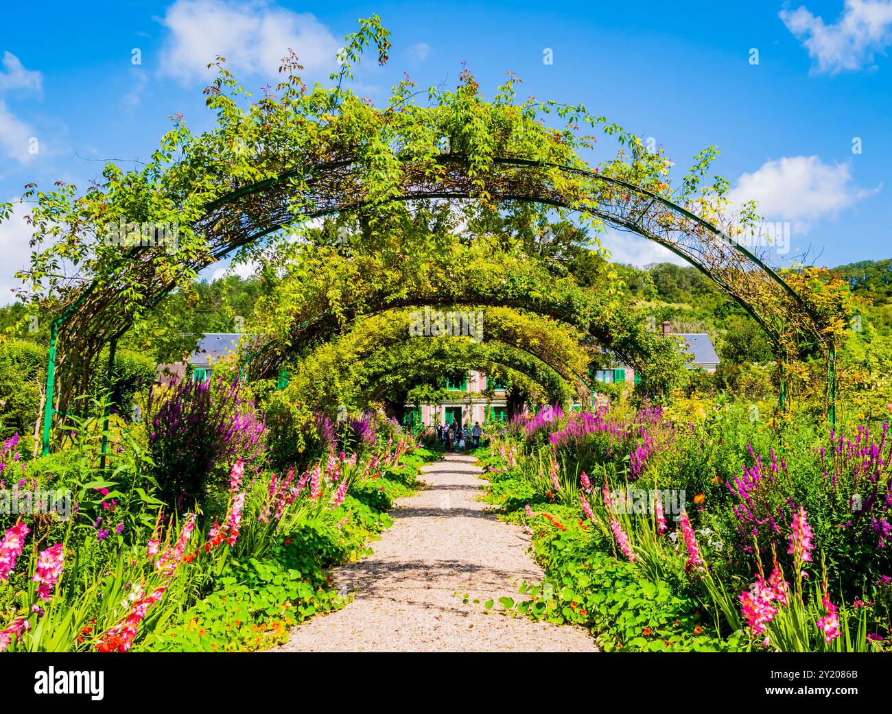 Impressive view of Monet's house and garden on a bright sunny day, with ...