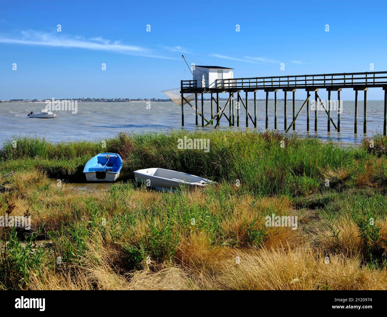 Fisherman's Cabin or carrelet and small boats at Fouras in France, also ...