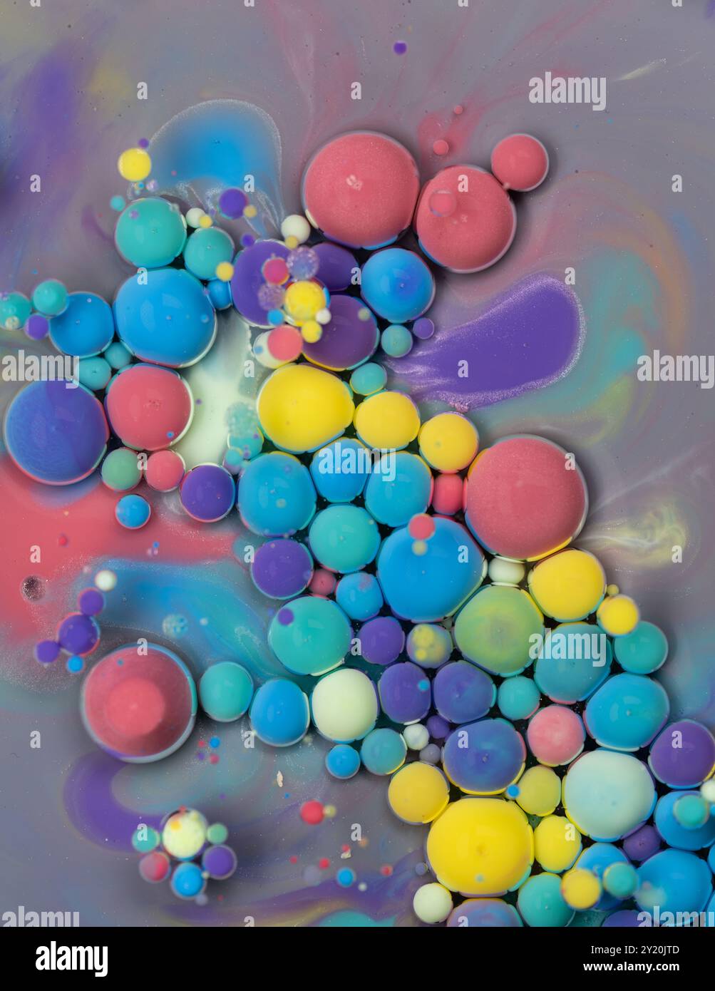 Colorful abstract composition created with vibrant paint blobs on a ...