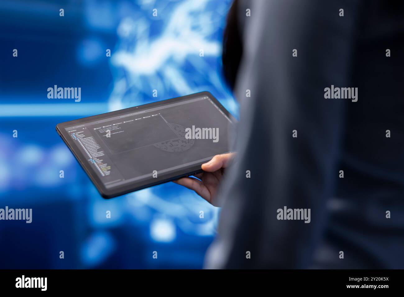 Programmer Using Tablet To Maintenance Artificial Intelligence Neural