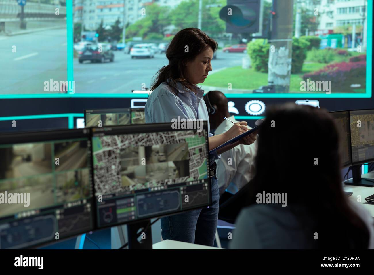 Multiethnic cctv operators control hi-res stock photography and images - Alamy