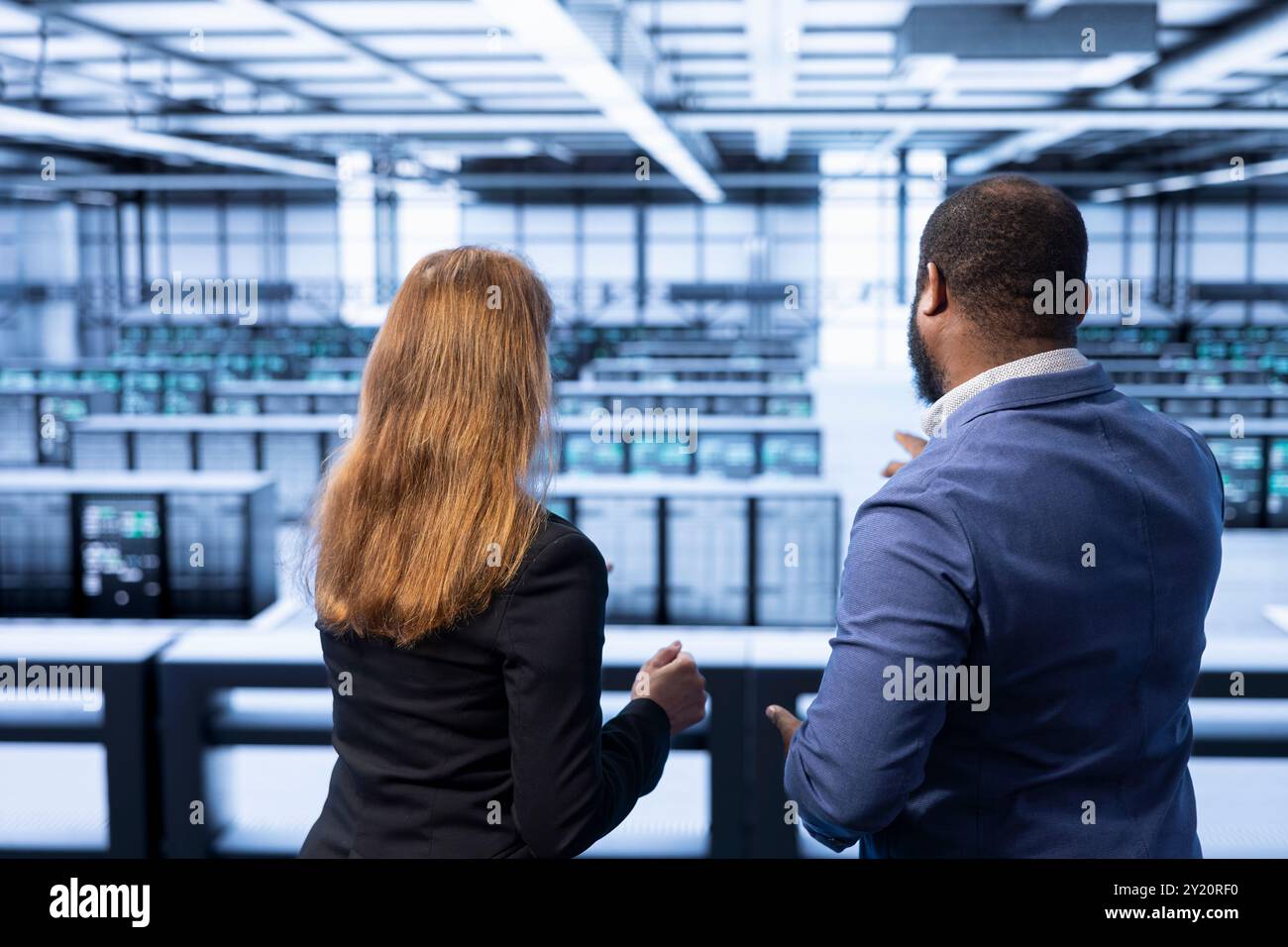 Data center team configuring hi-res stock photography and images - Alamy