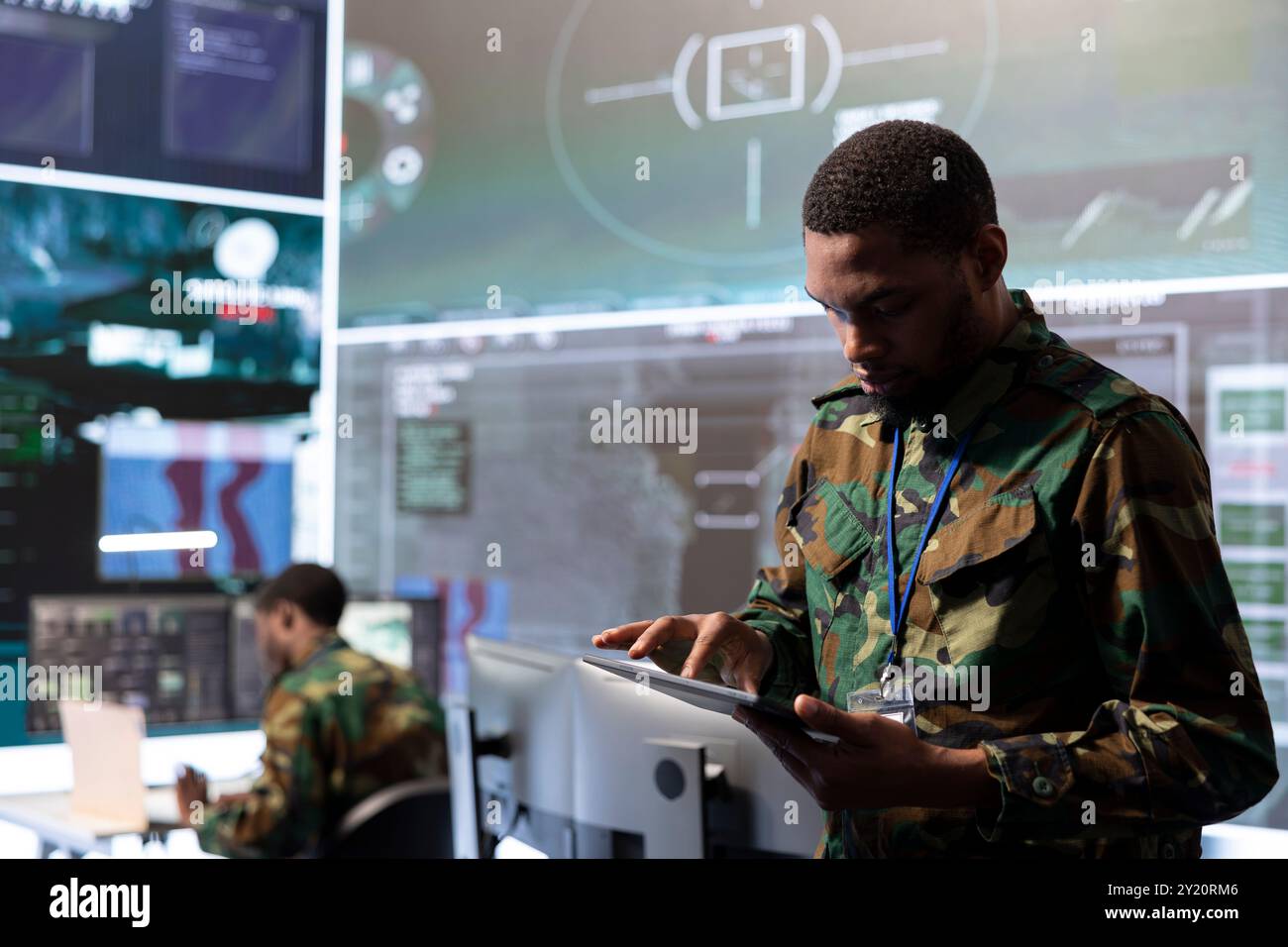 Government intelligence officers in control room manage surveillance ...