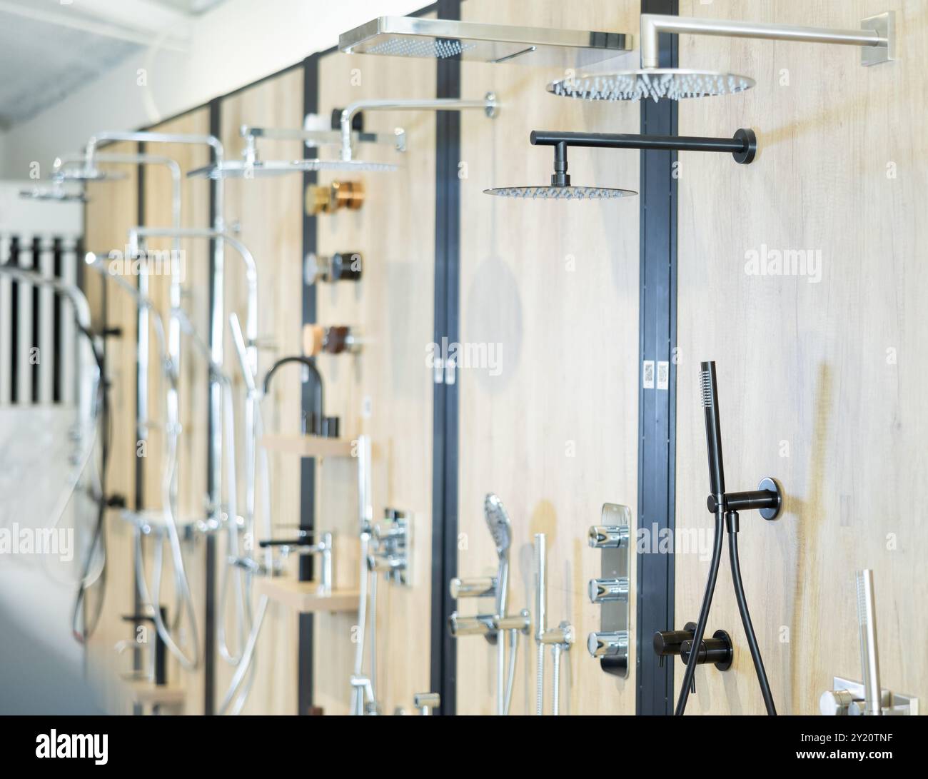Modern showerheads and bathroom fixtures on display in home improvement ...