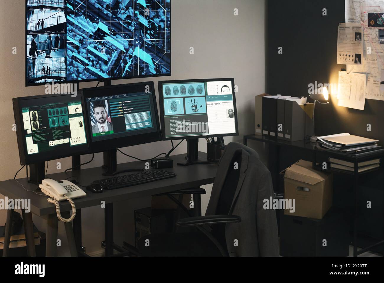 Monitoring and analyzing security footage in a modern surveillance room ...