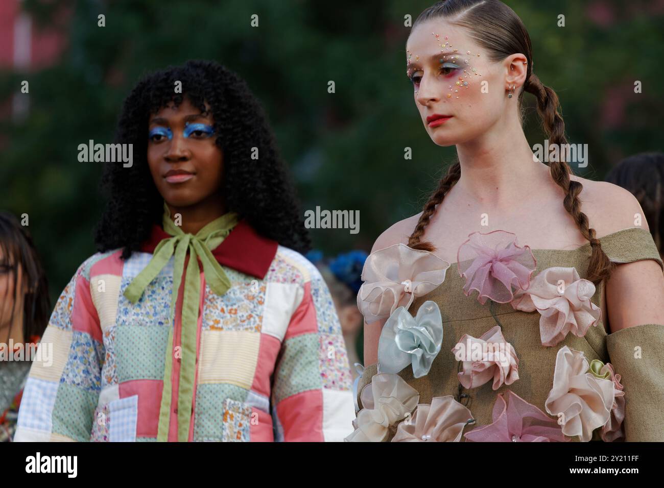 Models pose on the runaway at the Marie-Victorin fashion show in ...