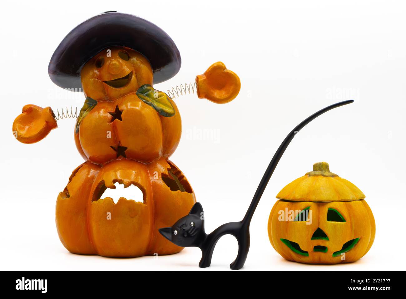 Jack O Lantern and and a black cat figurine. Ceramic candle holder in ...