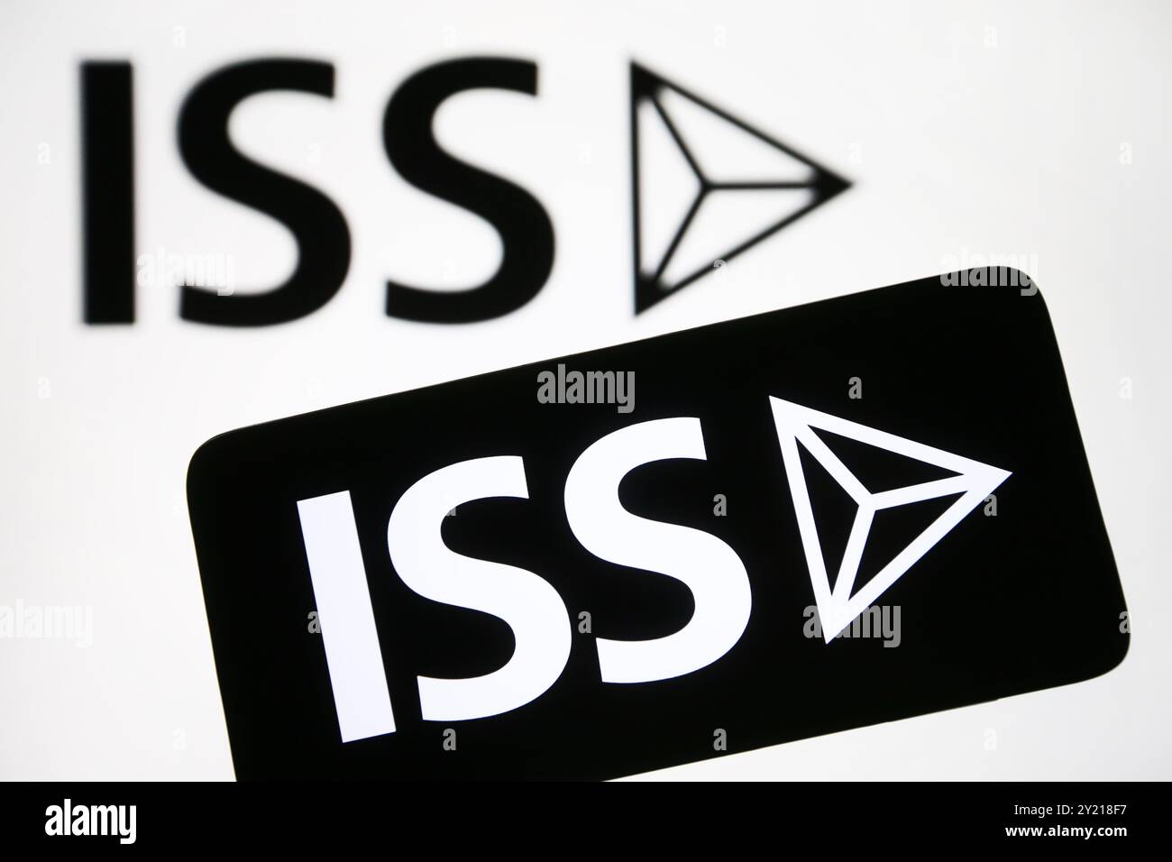 In this photo illustration, an Institutional Shareholder Services Inc. (ISS) logo is seen on a ...