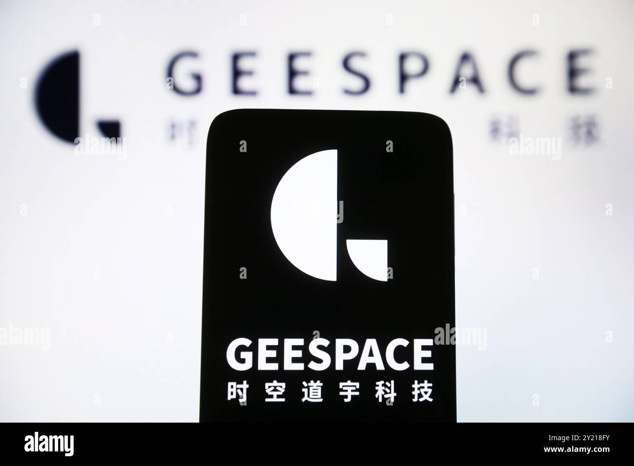 In this photo illustration, a Geespace logo is seen on a smartphone and ...