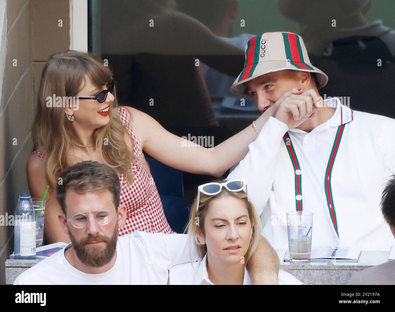 New York, United States. 08th Sep, 2024. Travis Kelce kisses the hand ...