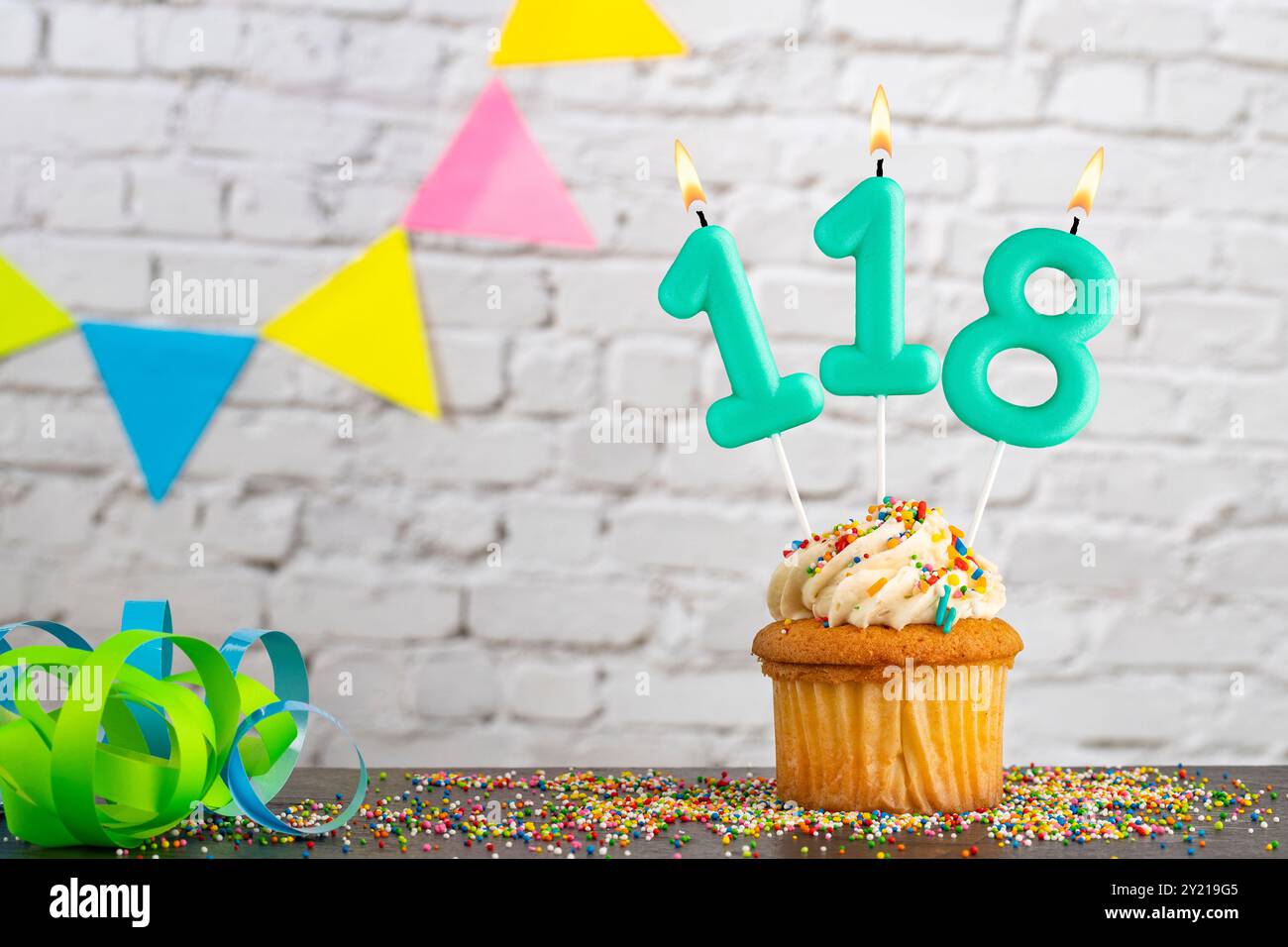 Candle number 118 - Birthday celebration with cupcake Stock Photo - Alamy