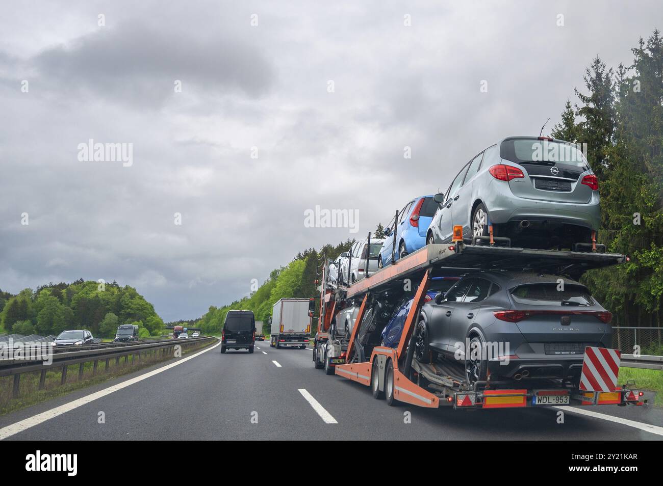 Truck transporter loaded with new cars on the A6 motorway, Bavaria ...