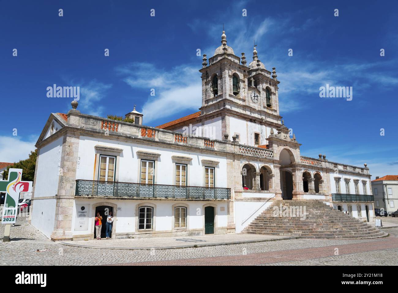 Baroque church building with striking towers, wide stone steps and ...