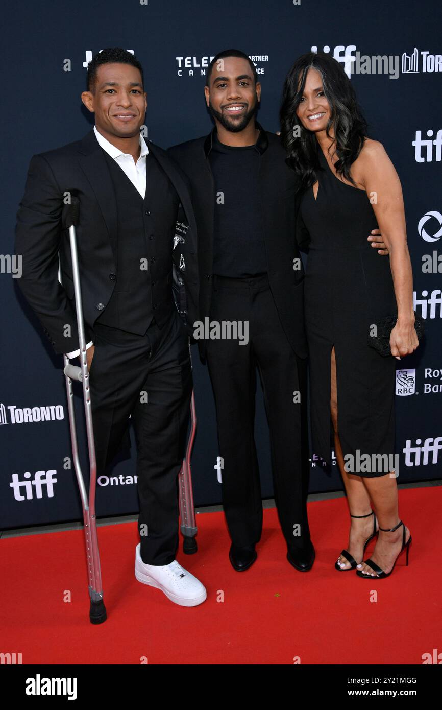 Anthony Robles, from left, Jharrel Jerome, and Judy Robles attend the TIFF Tribute Awards at ...