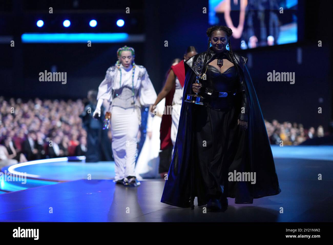 Elissa Alcala, and Devon Patterson onstage with the Emmy for ...