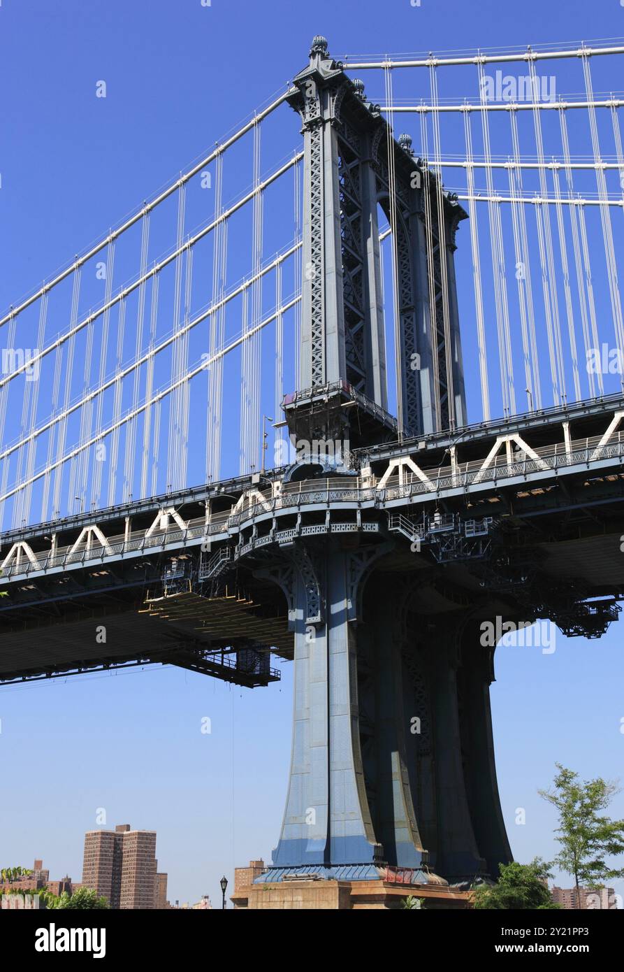 New York City bridge pillar with deep blue sky Stock Photo - Alamy