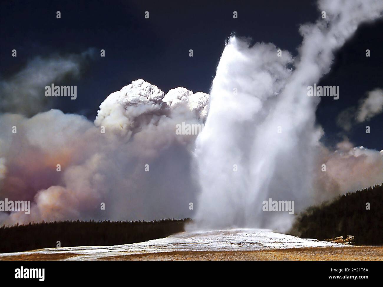 Old Faithful Geyser in Yellow Stone NP with the great forest fire of ...