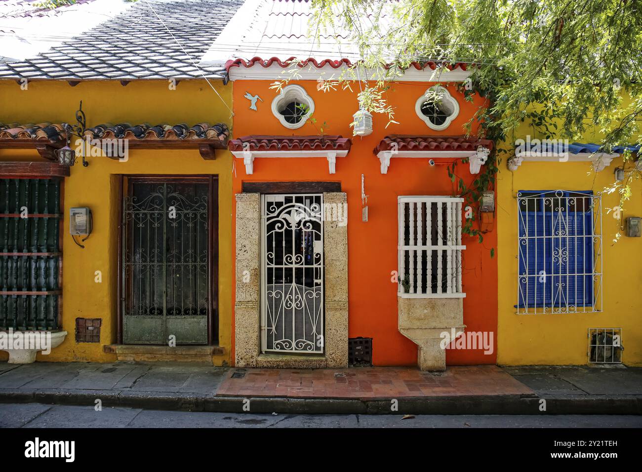 Colorful house facades in the Gethsemane neighborhood of Cartagena on a ...