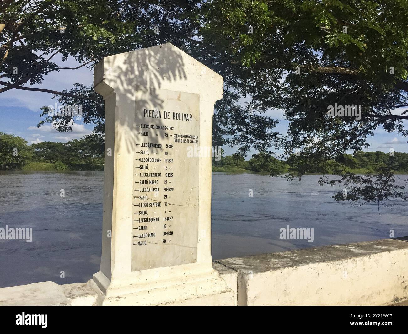 Piedra de Bolivar (memorial stone of Bolivar) at the river in sunlight ...
