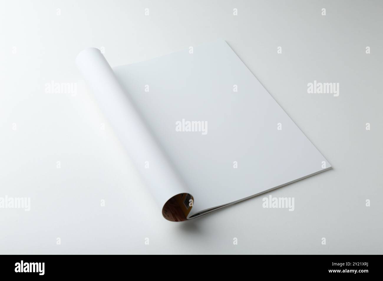 Open magazine with blank page on white background. Mockup for design ...