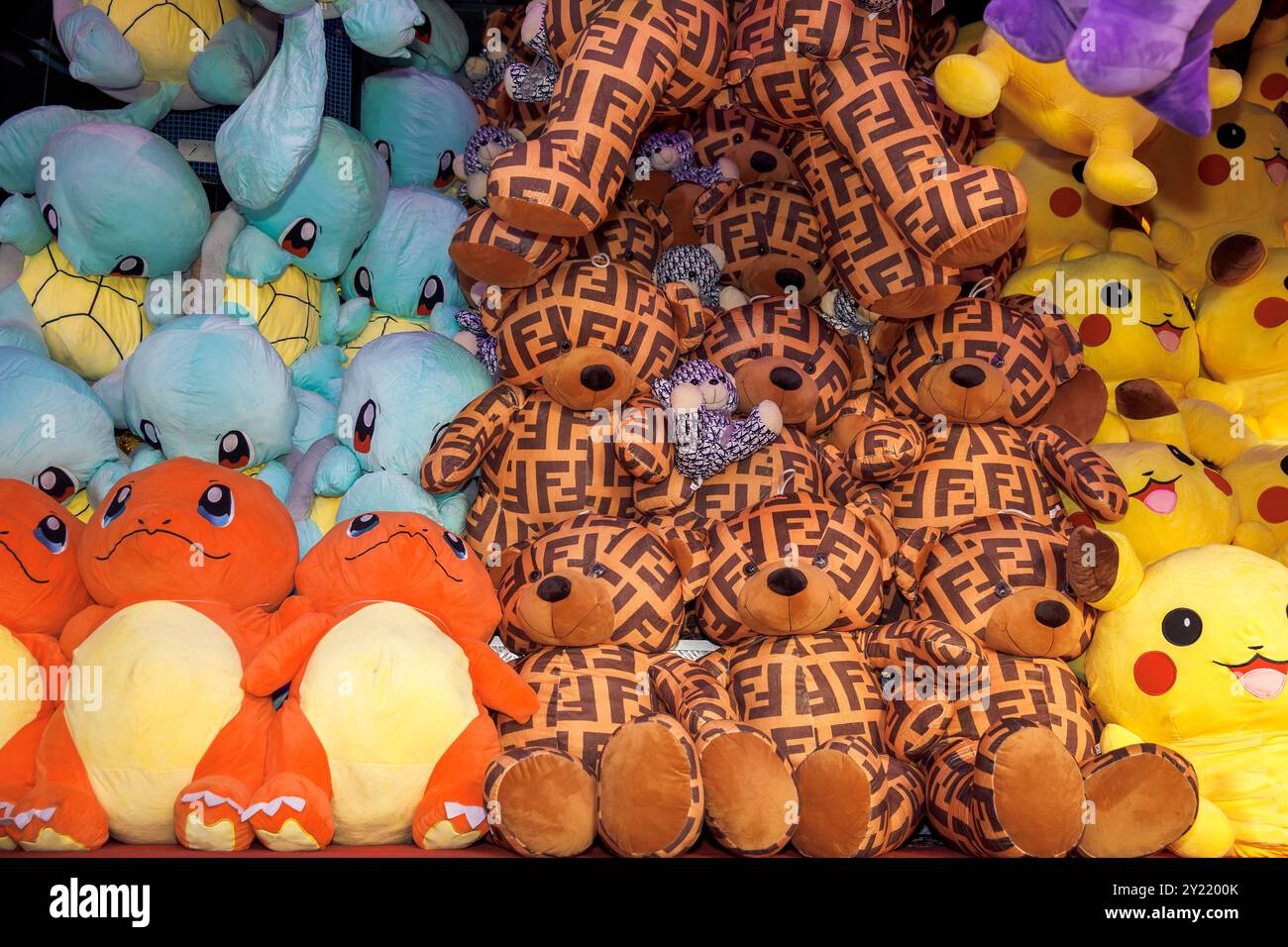 Plush collection of stuffed animals, toy bears, colorful characters ...