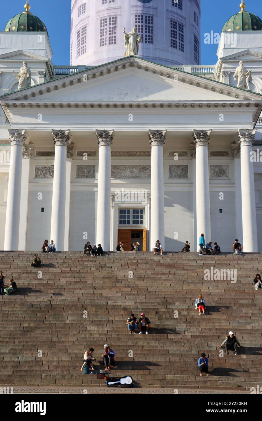 People sitting on the steps of Helsinki Cathedral, Helsingin ...