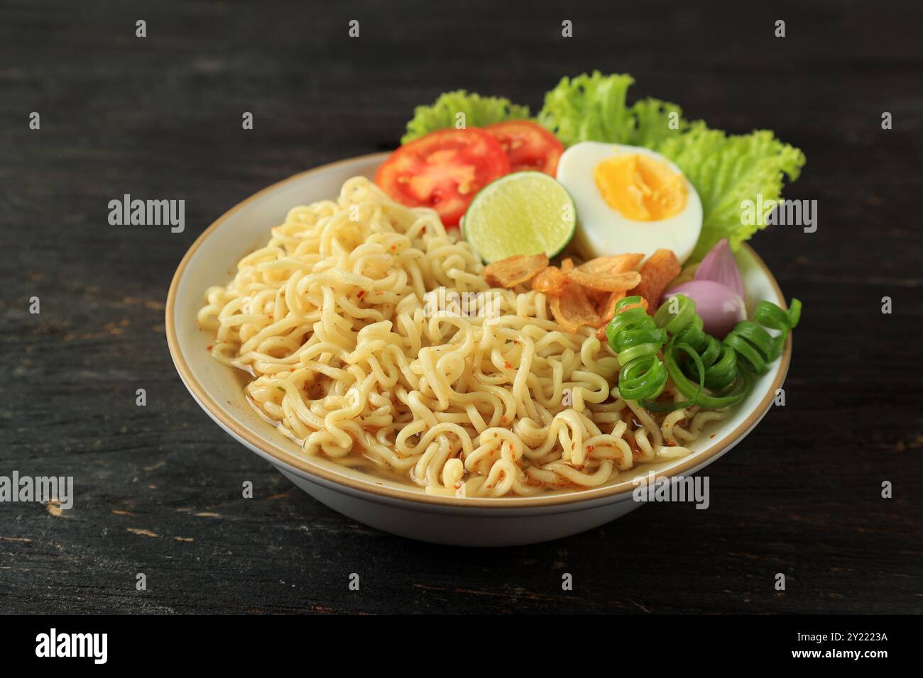 Indomie Rebus or Instant Boiled Noodle with Boiled Egg, Tomato, and ...
