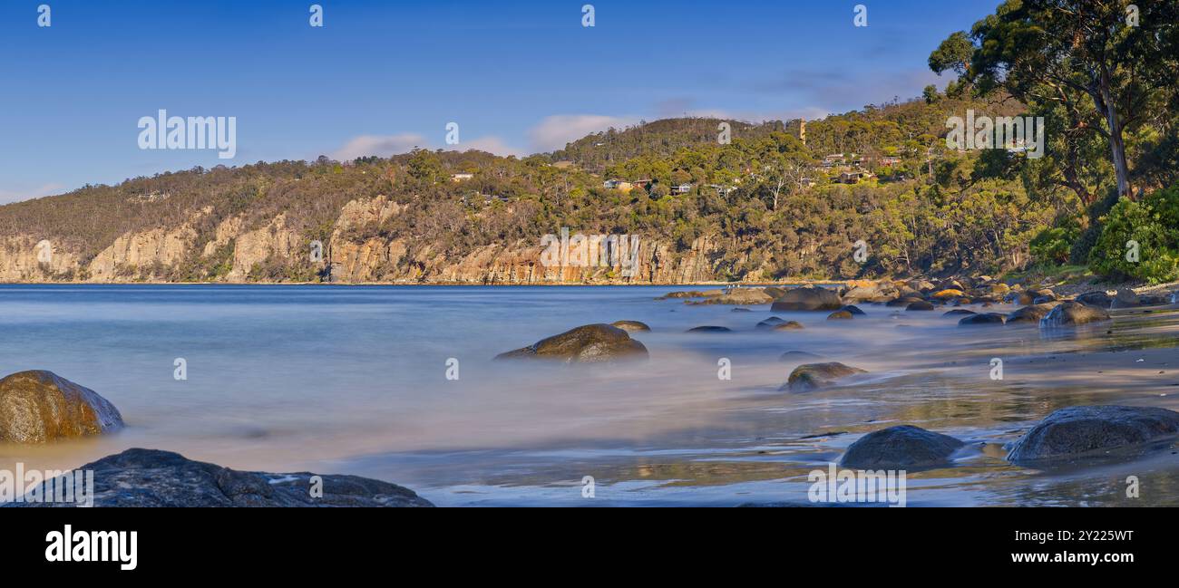 Derwent river ocean sea and Alum cliffs with beach and trees on sunny ...