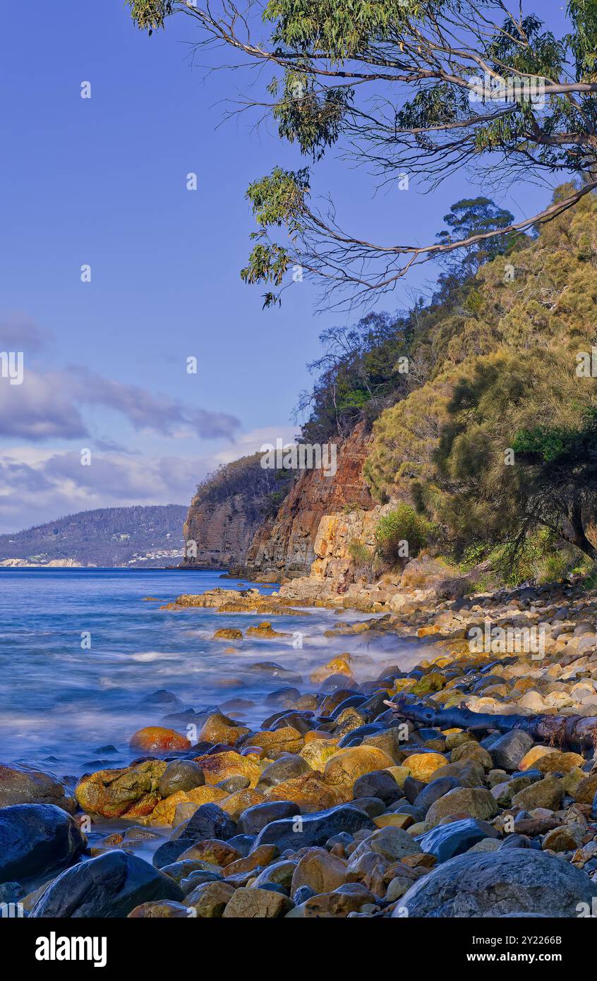 Derwent river ocean sea and Alum cliffs with beach and trees on sunny ...