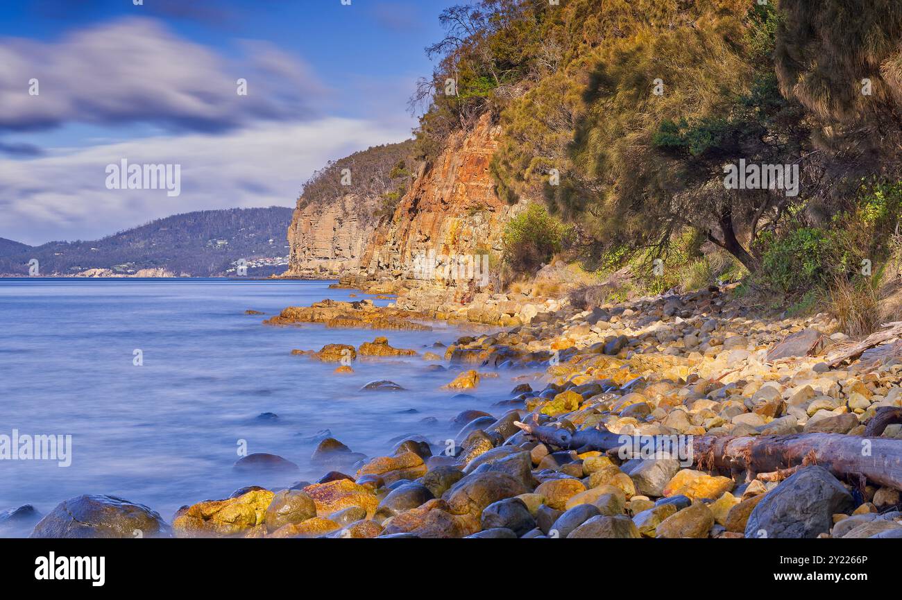 Derwent river ocean sea and Alum cliffs with beach and trees on sunny ...
