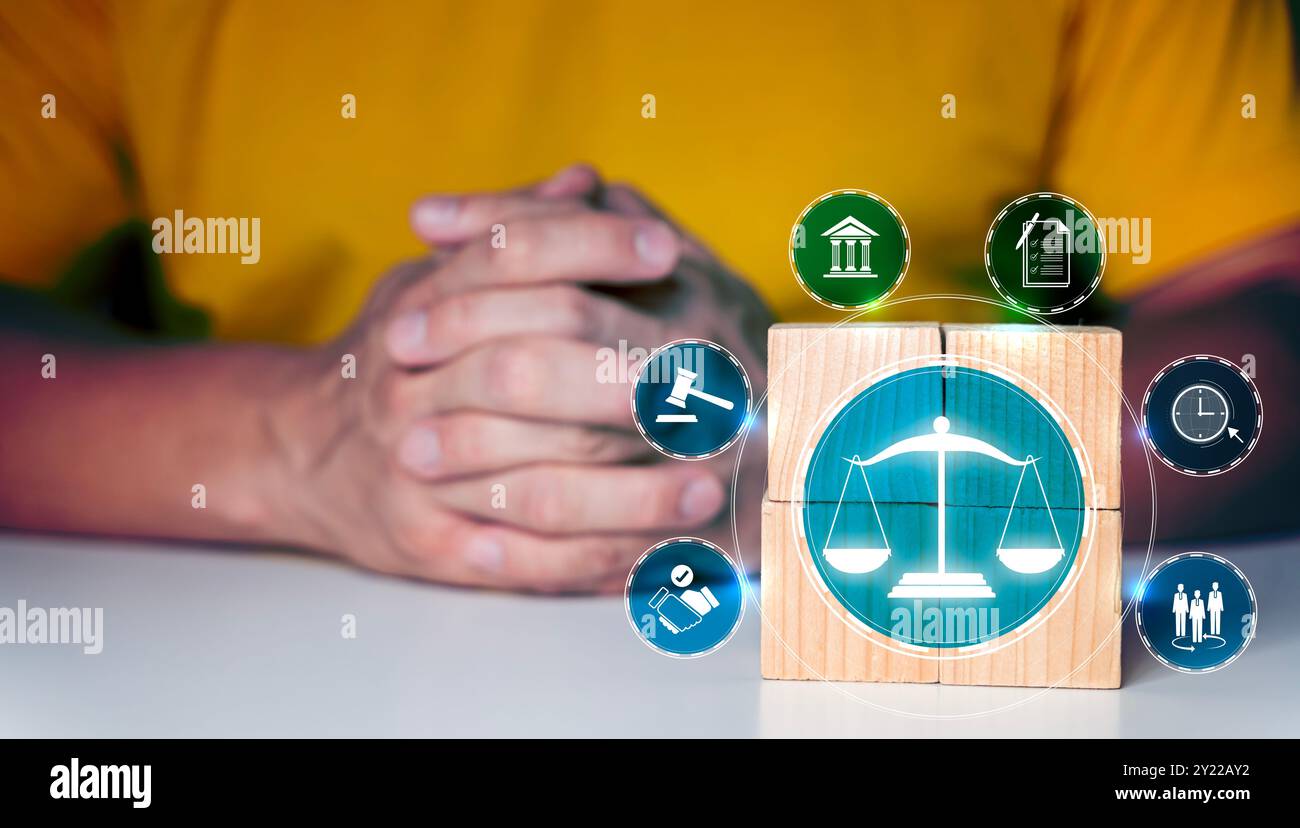 Wooden blocks laying on the table,law legal services advice and ...